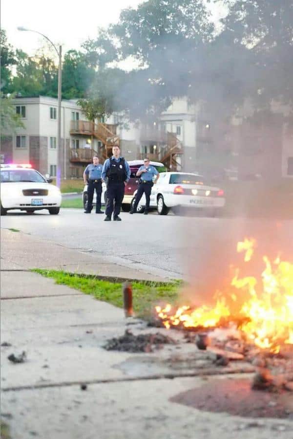 The Source |Ferguson Residents Uneasy As Mike Brown Memorial Burns To ...
